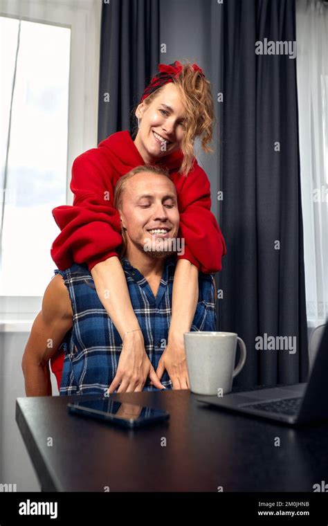 Engaged Couple Has Breakfast Together In Their New Home Young Couple