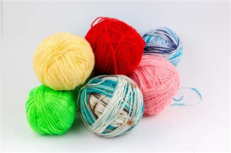 Premium Photo Close Up Shot Of Colored Wool Yarn Balls As Background