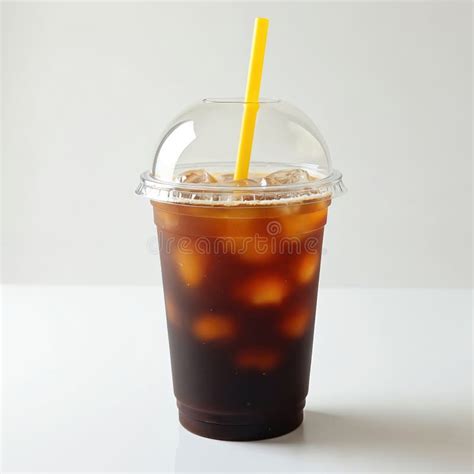 Iced Espresso Coffee In Clear Plastic Cup With Domed Lid And Yellow