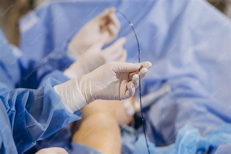 Premium Photo Doctor Surgery Foot Suturepercutaneous Transluminal