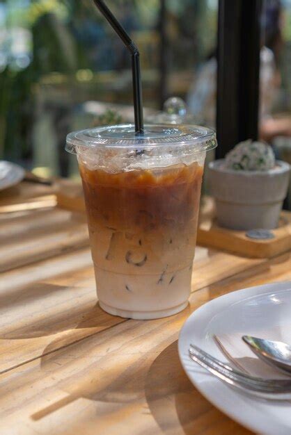 Premium Photo Cold Brewed Iced Latte Coffee Showing Separate In A