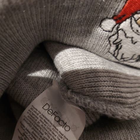 قیمت و خرید کلاه بافتنی زنانه دفکتو مدل بابانوئل آنتی باکتریال پوم دار