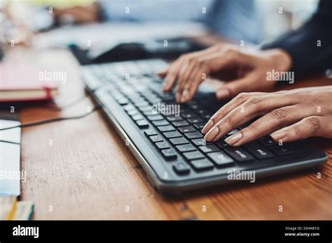 hands keyboard and typing in office with person computer and editing