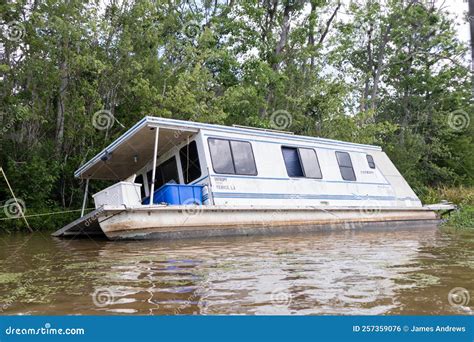 Old Sinking Houseboat On The Old Pearl River In A Rural Area Of