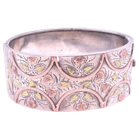 Victorian Silver And Gold Bangle With Roses Leaves And Lillies Circa