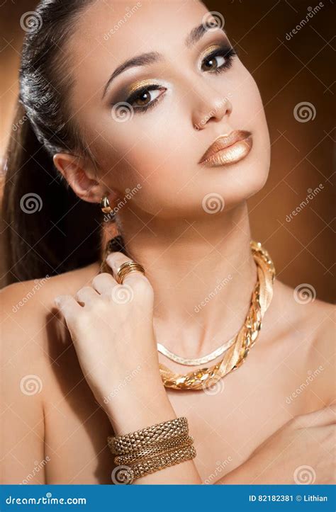Woman Wearing Gold Jewelry Stock Image Image Of Precious Lashes 82182381