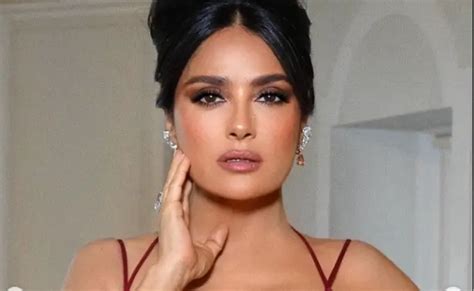 In A Daringly Red Cocktail Dress Salma Hayek Put On A Very Busty Display As She Attended A