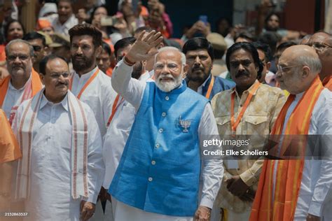 Indias Prime Minister Narendra Modi Greets Supporters After Filing