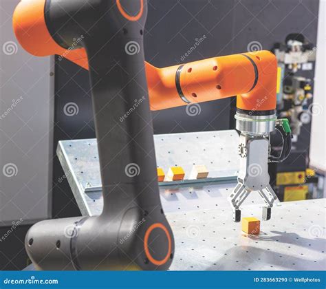 A Robotic Arm Is Tending To Rows Of Hydroponic Lettuce In A Modern Glass Greenhouse Stock Image