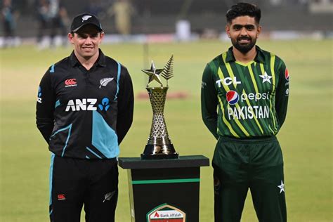 Tom Latham And Babar Azam Pose With The Trophy Espncricinfo