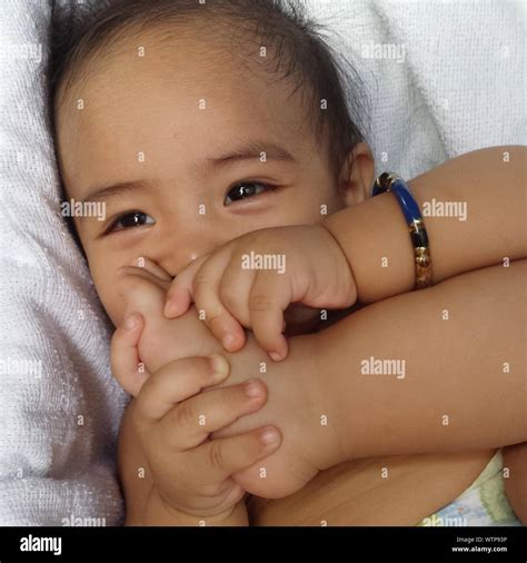 Baby Biting Hi Res Stock Photography And Images Alamy