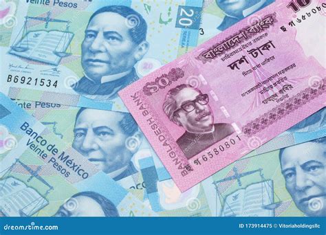 A Ten Taka Note From Bangladesh On A Background Of Dollar Bills Stock Image Image Of Bank