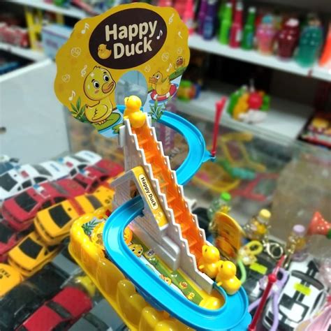 خرید و قیمت اسباب بازی پله برقی اردک موزیکال و چراغدار از غرفه اسباب بازی پاشاتوی