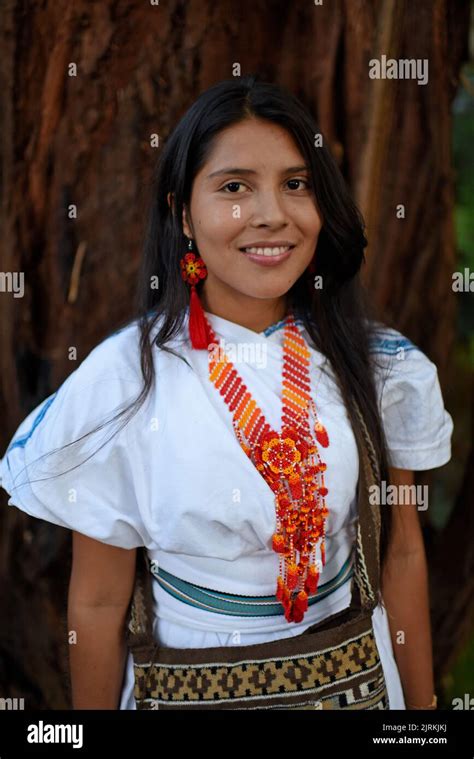 Portrait Of A Happy Young Arhuaco Indigenous Woman In A Forest Of