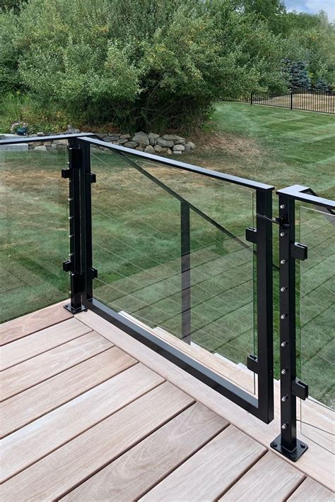 Glass Rail With A Gate Creates A Beautiful Enclosed Deck Metal Deck Railing Modern Railing