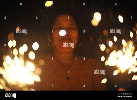Womanprepare To Fly Sky Lantern During Tihar Or Deepawali And Dewali