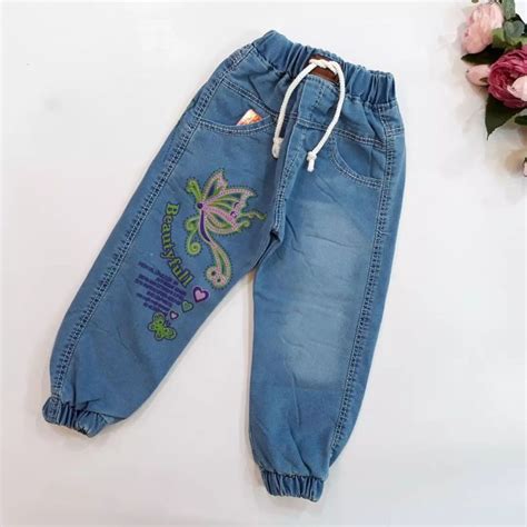 شلوار لی دخترانه لاینردار چاپ پروانه فروشگاه لباس بچگانه پارسامد