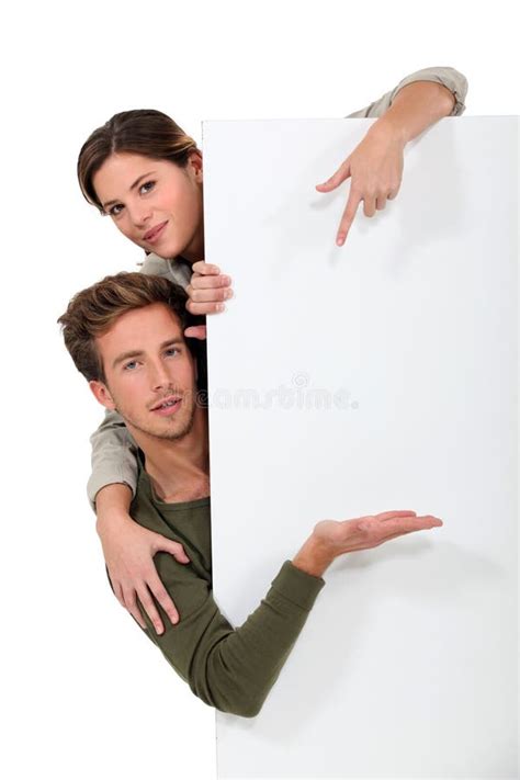 Man And Woman Pointing Stock Photo Image Of Cupped Hold