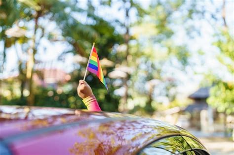 Premium Photo Happy Asian Woman Support Lgbt Pride Parade In Car With