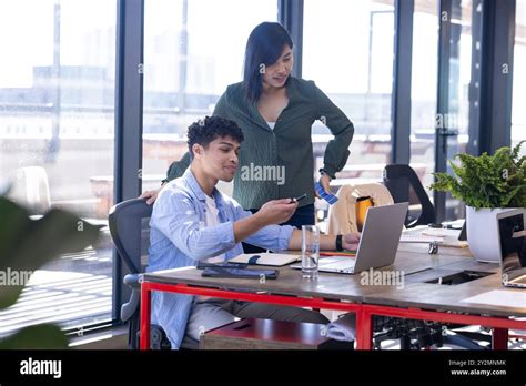 In Office Discussing Ideas Diverse Colleagues Collaborating On Interior Design Project Stock