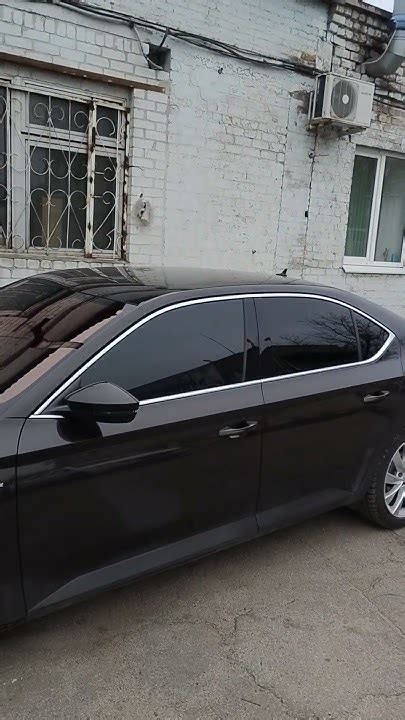 Тёмно-коричневая Skoda Superb III (2015–н.в.) тонированная чёрной ...