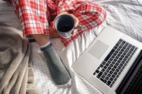 Premium Photo Female Crossed Legs Close Up In Bed Feet Of Young Lady