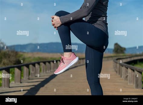 Leg Stretching Exercise Fitness Runner Woman Doing Running Warm Up