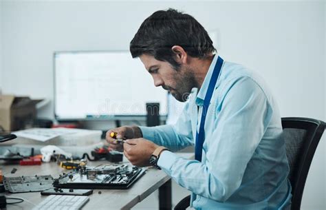 Man Circuit And Tools At Repair Workshop For Maintenance Computer