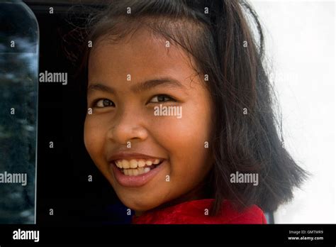 A Young Khmer Girl Is Posing For A Portrait In Chork Village Cambodia