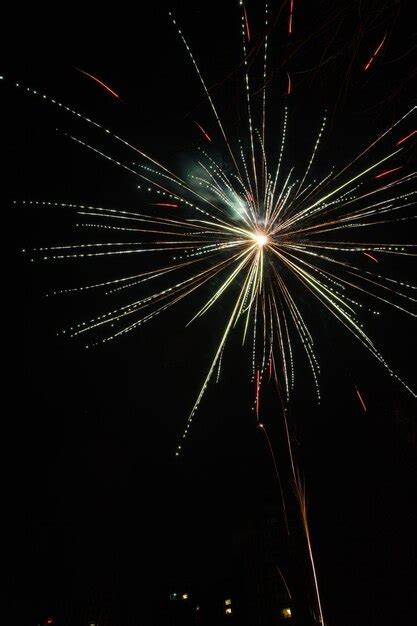 Premium Photo Firework Display Against Sky At Night