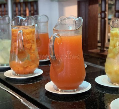 Assorted Juices In Glass Jugs At Buffet Stock Image Image Of Mango