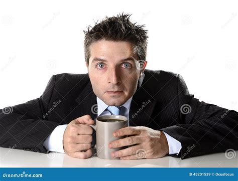 Addict Businessman Holding Cup Of Coffee Anxious And Crazy In Caffeine
