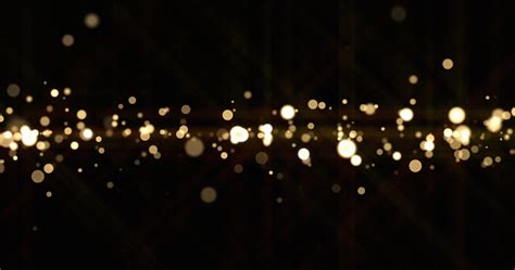明るい光のボケの火花輝く粒子やほこりがぼやけた波の効果を輝かせます光沢のある雪きらめく光と魔法の輝きの輝きクリスマスの贅沢な背景 3dの