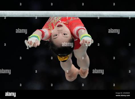 Zhang Yihan Of China Performs On The Uneven Bars During The Womens Artistic Gymnastics Team
