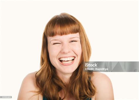 Beautiful Young Redhead Woman Smiles And Laughs In Sheer Joy Stock