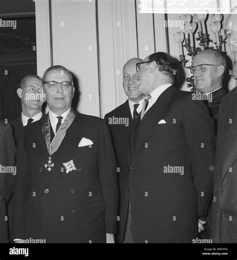 The Photograph Depicts A Ceremony Where The British Ambassador Honors