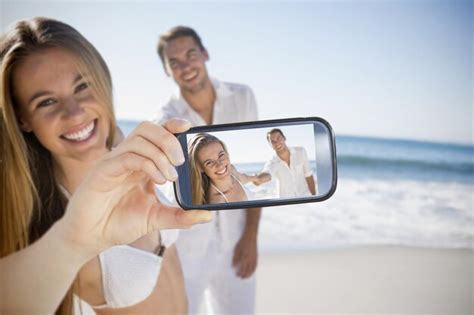 Premium Photo Composite Of Couple Taking Selfie On Smartphone