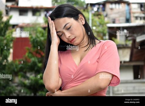 A Tired Asian Adult Female Stock Photo Alamy