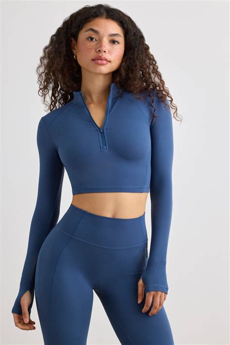 Soft Active Half Zip Crop Top In Washed Navy Oh Polly