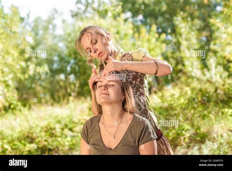 Massage Professional Provides A Thorough Massage In The Daylight Stock