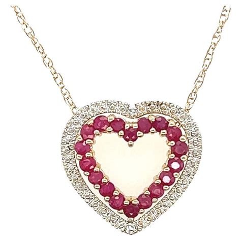 10 Karat White Goldyellow Gold Ruby And Diamond Double Heart Pendant