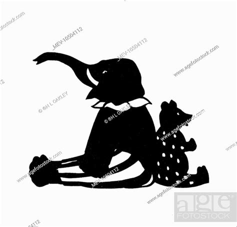 Silhouette Of A Toy Elephant And A Teddy Bear Sitting Back To Back