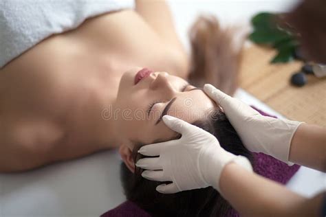 Skin And Body Care Close Up Of A Young Woman Getting Spa Treatment At