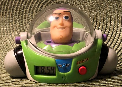 Pixars Buzz Lightyear Bust Clock Disleelandia