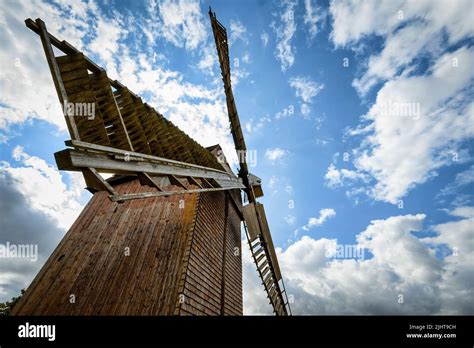 A View Of A Beautiful Windmill In Germany In A Natural Setting And An