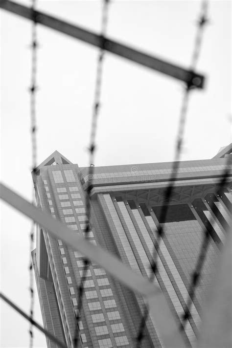 Architectural Detail Of Modern Tall Multistoried Building Structure Seen Through Blurred