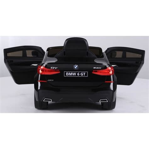 Детска електрическа кола Bmw серия 6 Gt 12 V с радио дистанционно