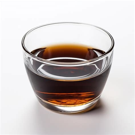 Premium Ai Image Dark Molasses In Glass Bowl