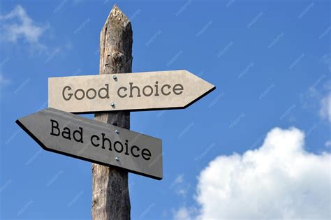 Premium Photo Good Choice Or Bad Choice Wooden Signpost With Two
