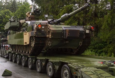 An M1a2 Abrams Equipped With Abrams Explosive Reactive Armor And The Trophy Active Protection